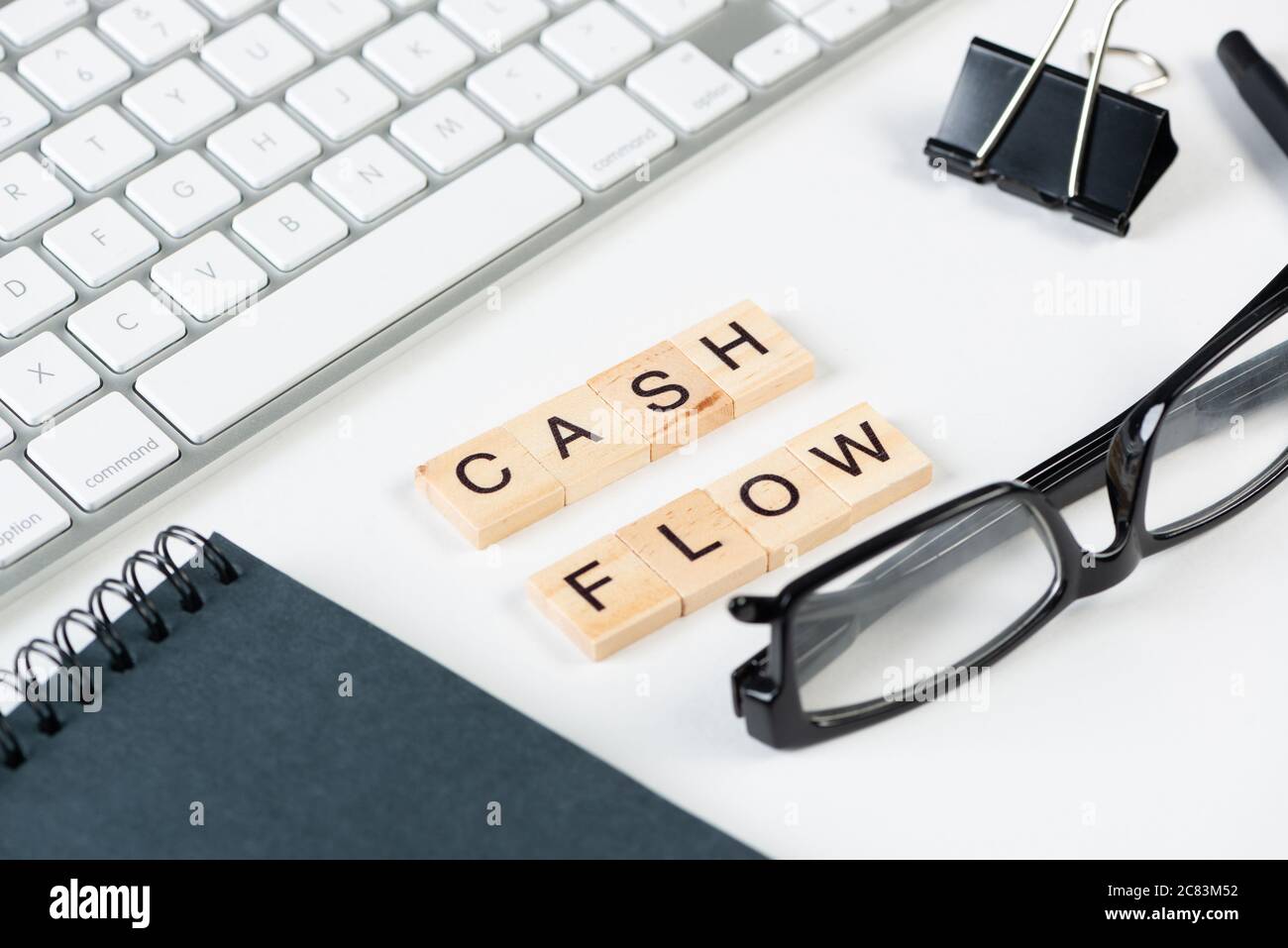 Cash flow statement concept with letters on cubes Stock Photo - Alamy