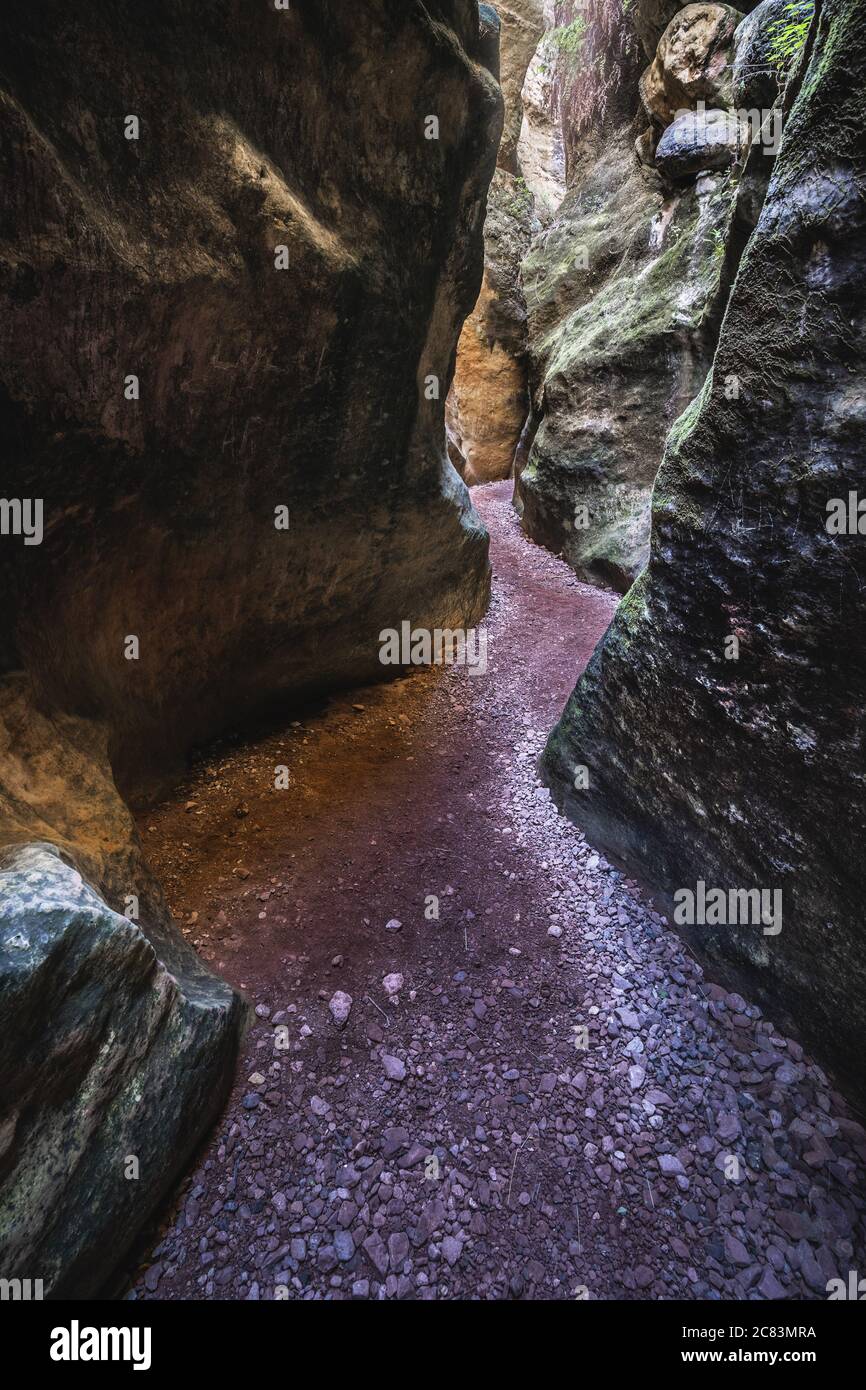 Breathtaking view of the narrow path between the enormous rocks Stock ...