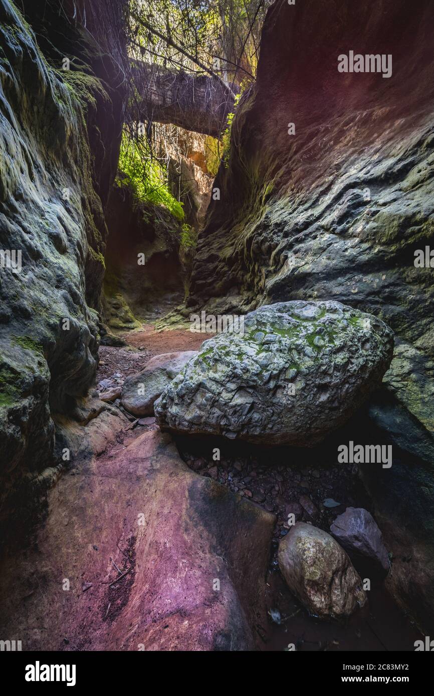 Breathtaking view of the narrow path between the enormous rocks Stock ...