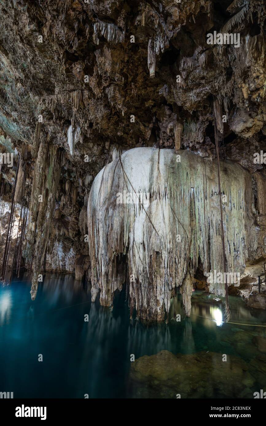 Stalagtite mineral formations over Cenote Xkeken near Dzitnup, Yucatan ...