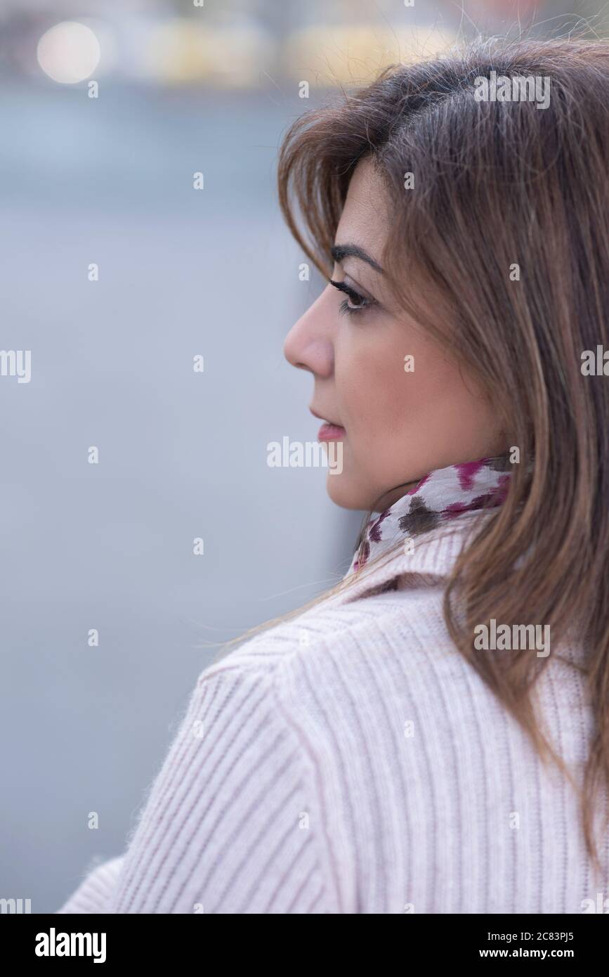 Woman looking back scared hi-res stock photography and images - Alamy