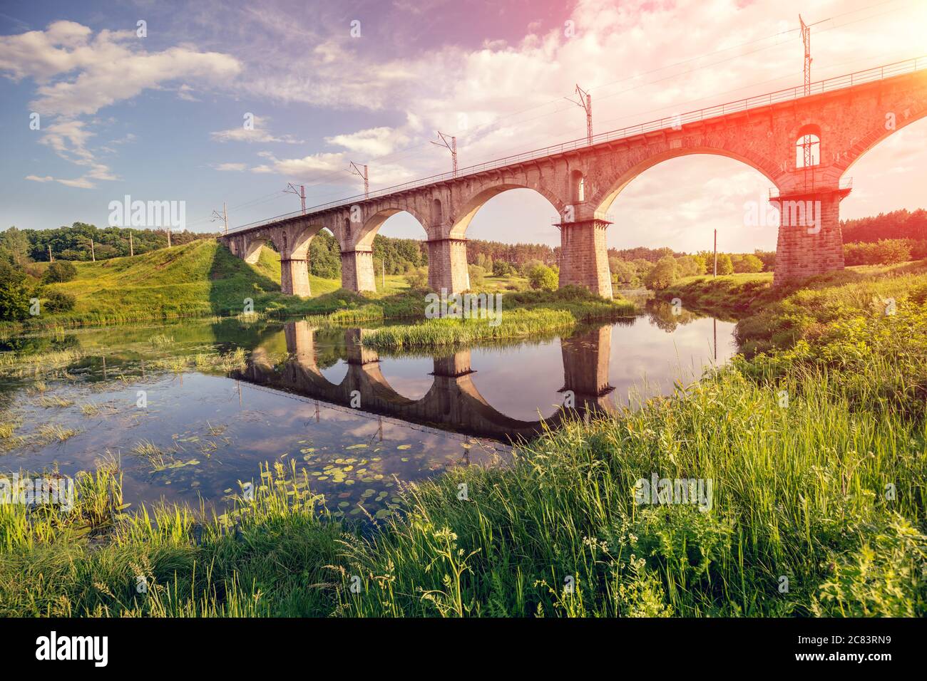 Old Arched Stone Railroad Viaduct Bridge over the river. Novohrad ...