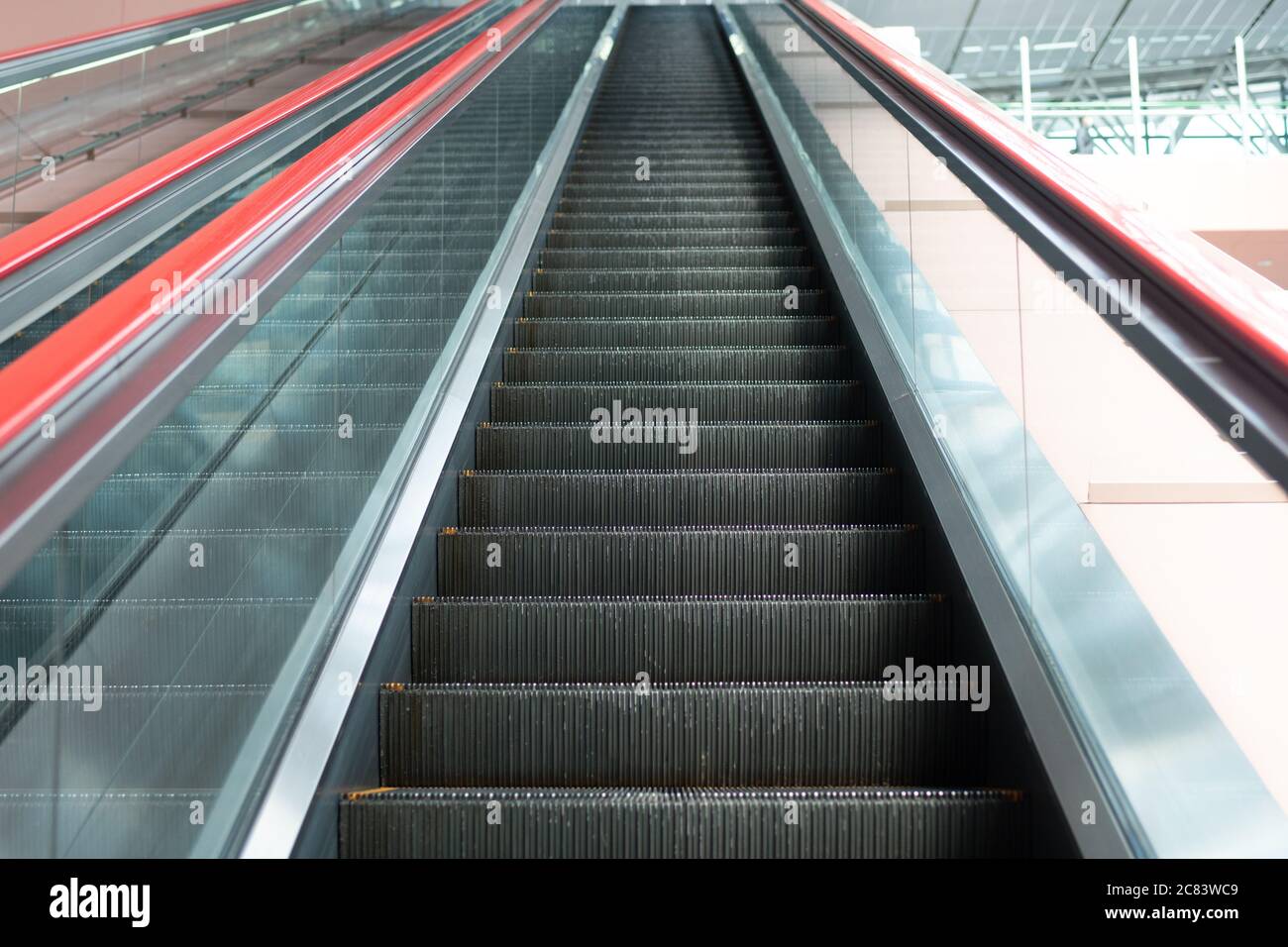 Escalator in shopping mall. Moving up and down staircase. electric escalator Stock Photo - Alamy