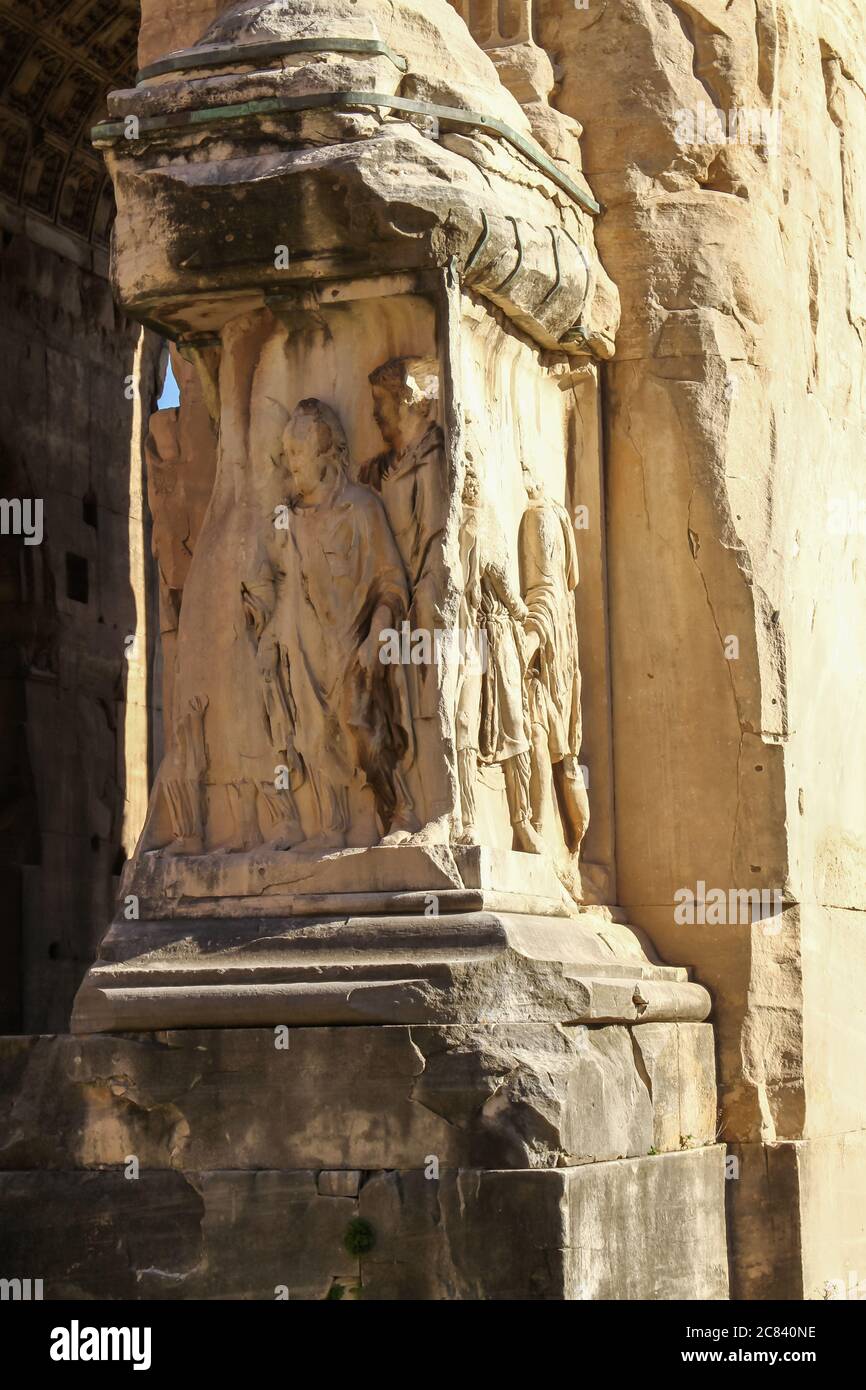 Vertical shot of the details on the ruins of the historical Arch of ...