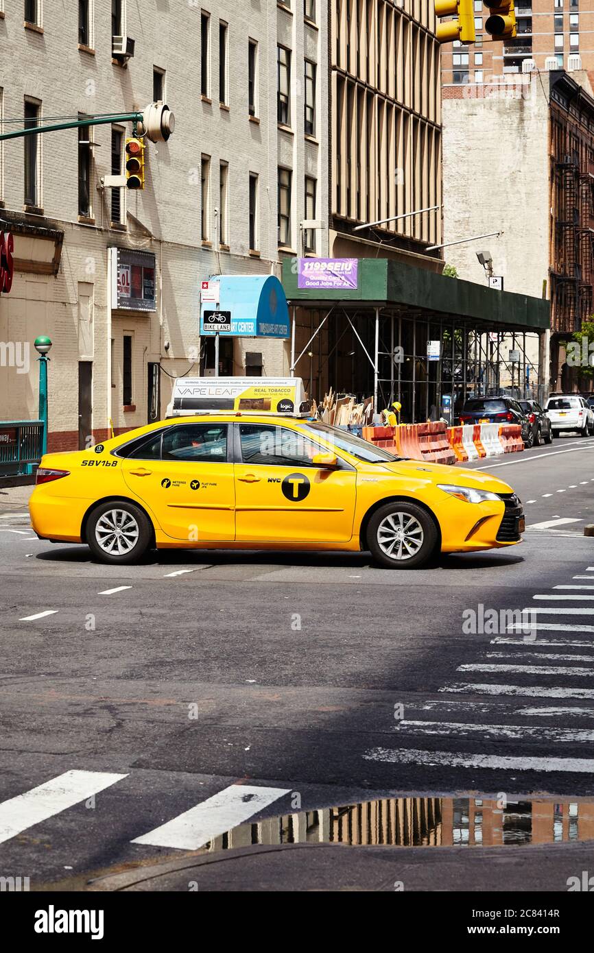 New York, USA - June 28, 2018: Yellow Taxi cab on the street of ...