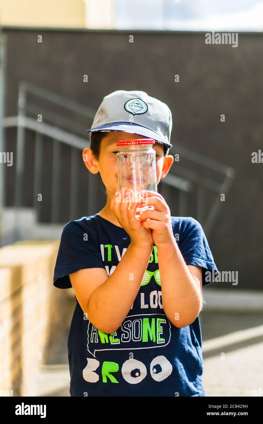 Kid holding bugs hi-res stock photography and images - Alamy