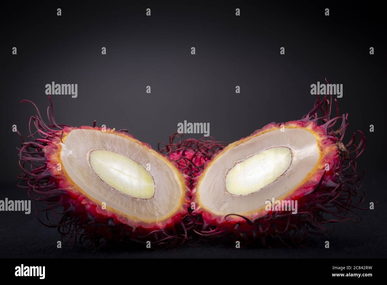 Rambutan tropical exotic edible fruit Stock Photo - Alamy