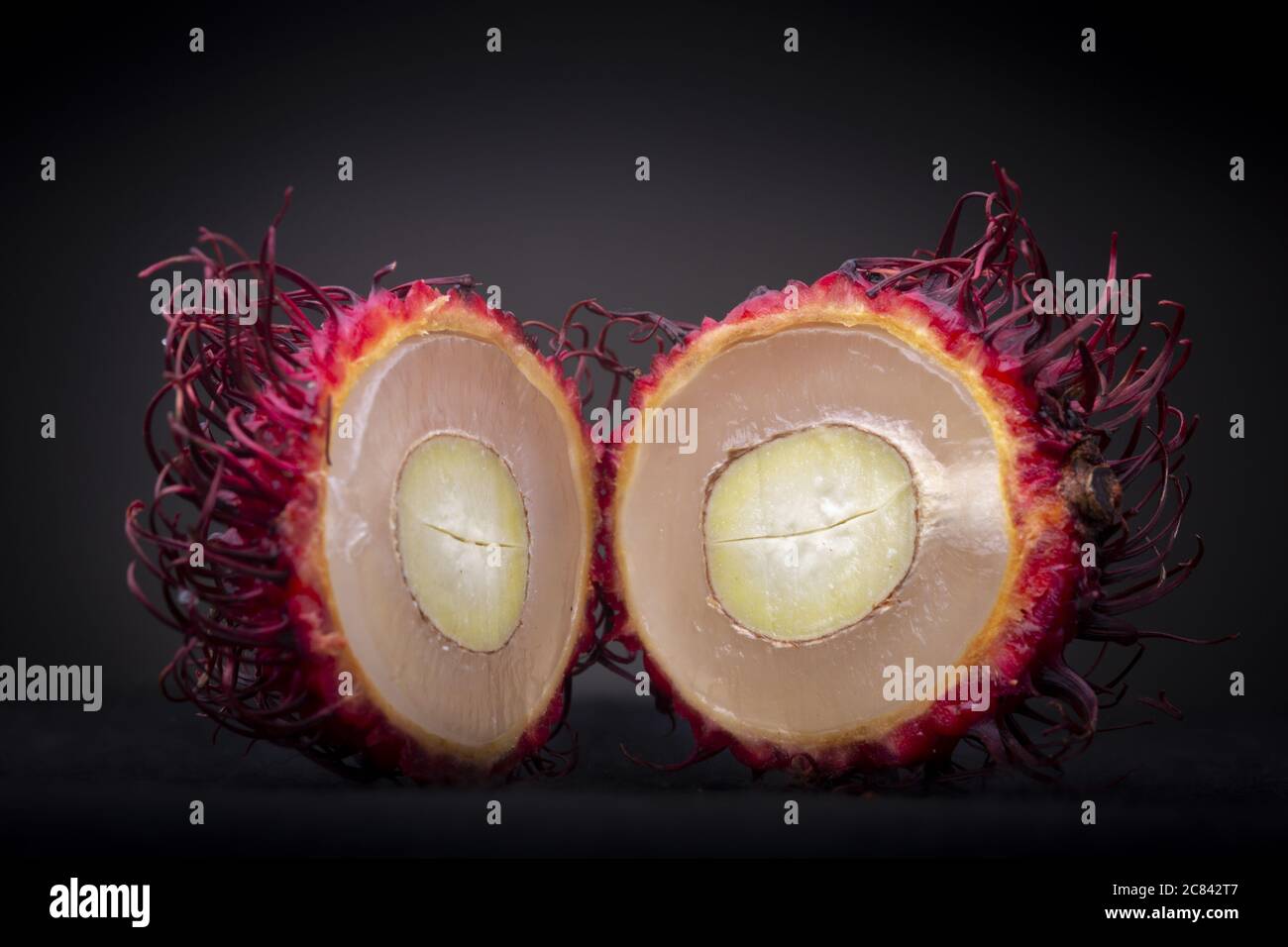 Rambutan tropical exotic edible fruit Stock Photo - Alamy