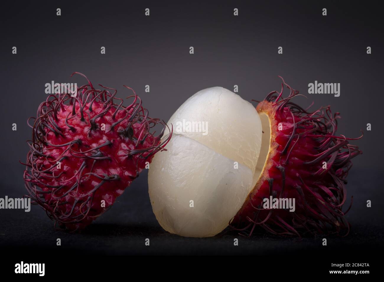 Rambutan tropical exotic edible fruit Stock Photo - Alamy