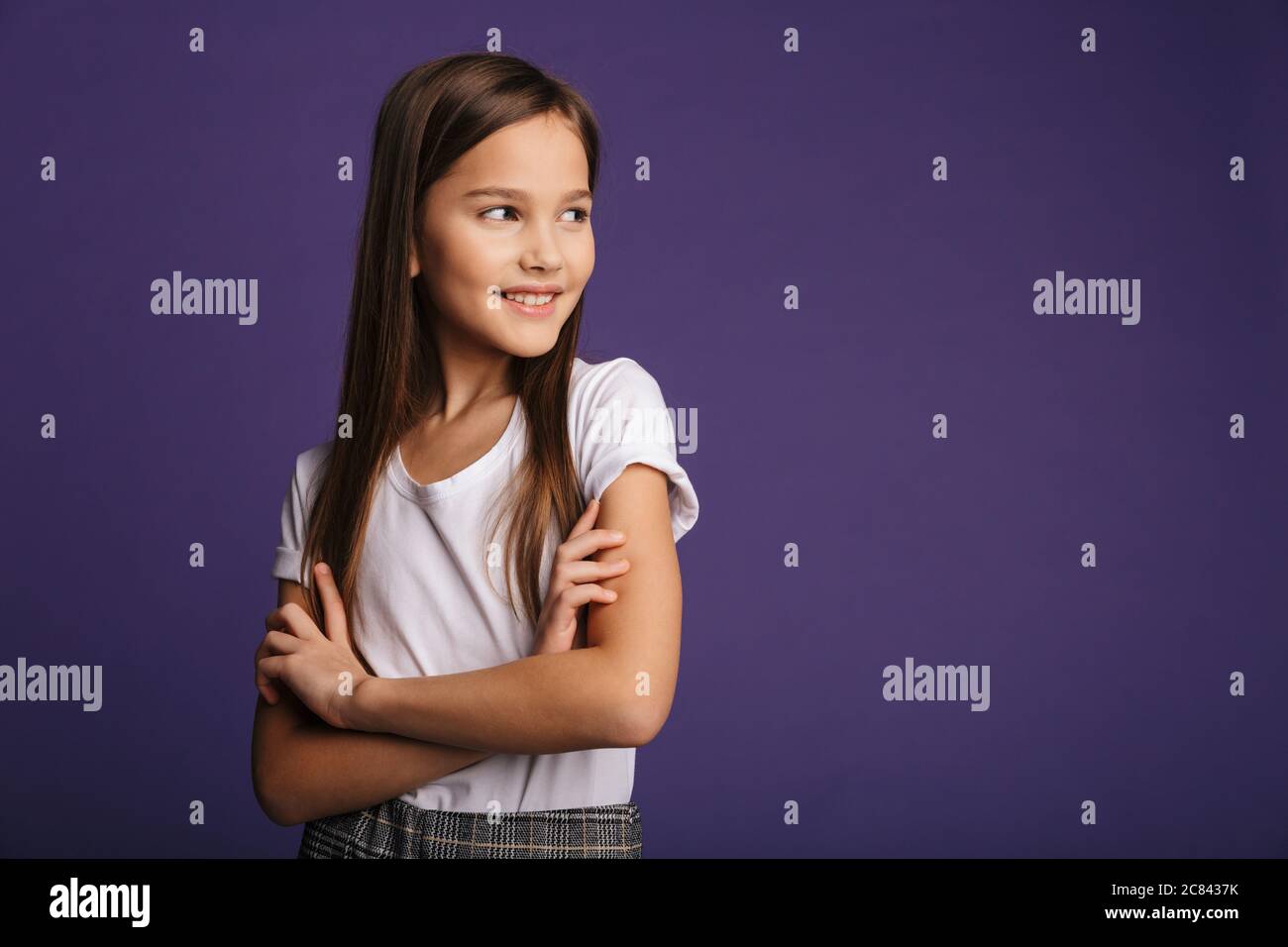 Photo of happy beautiful girl laughing and looking aside isolated over ...