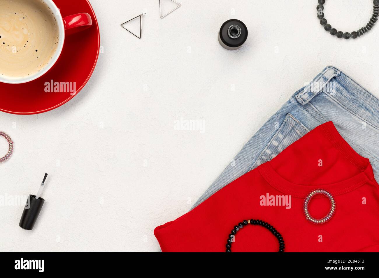 Women's clothing and accessories on white background Stock Photo - Alamy