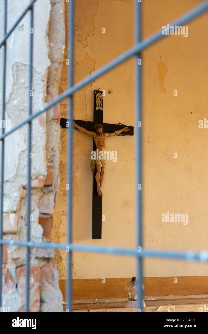 Jesus on the cross in concentration camp for people victims of the ...