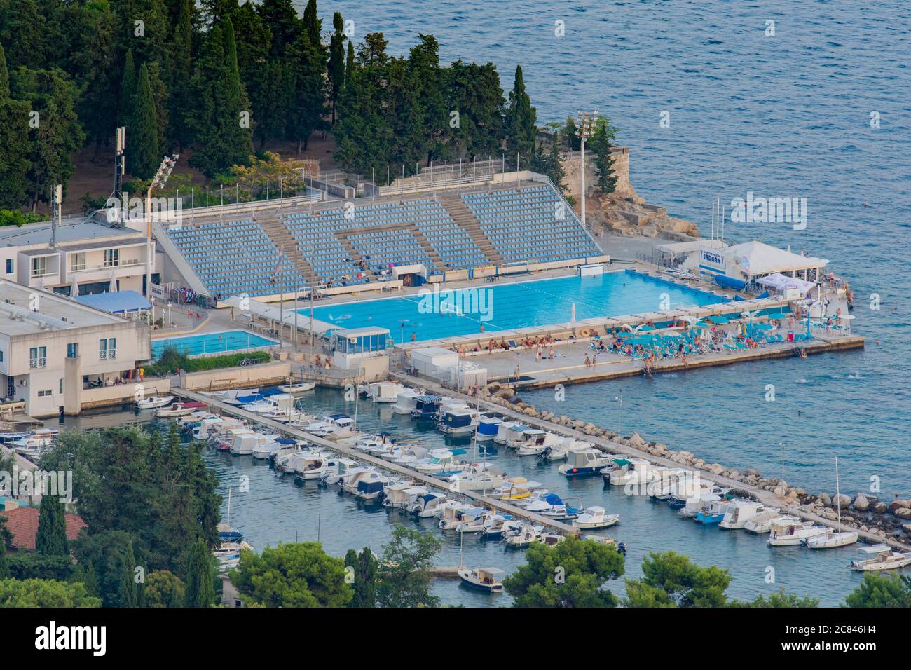 Split, Croatia - August 9 2018: People swimming and playing water polo ...