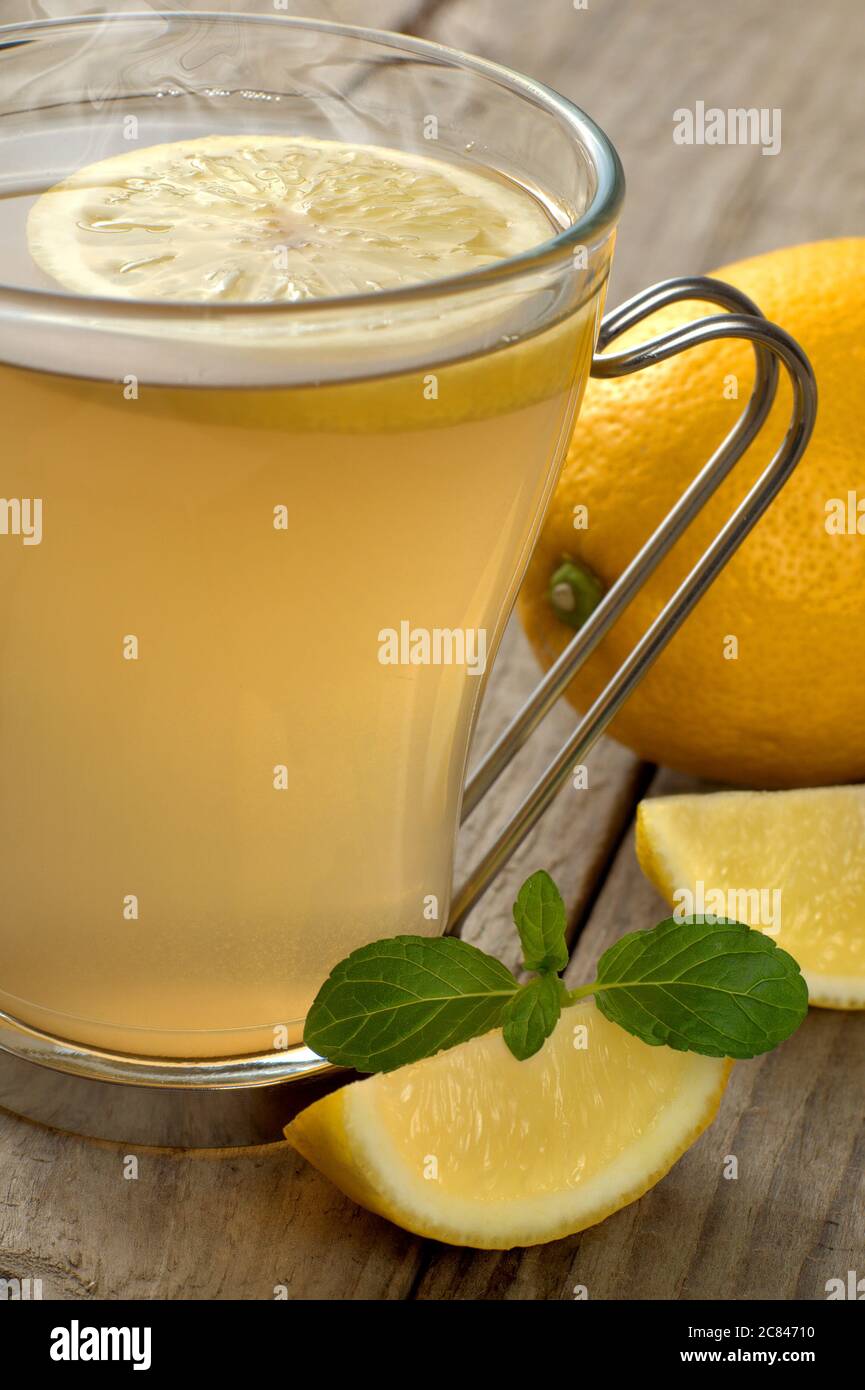Hot tea with lemon and mint Stock Photo - Alamy