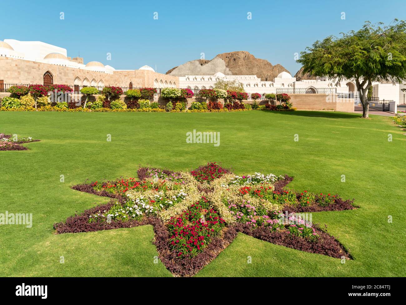 Muscat, Oman - February 10, 2020: Flowered garden of the Al Alam Palace ...