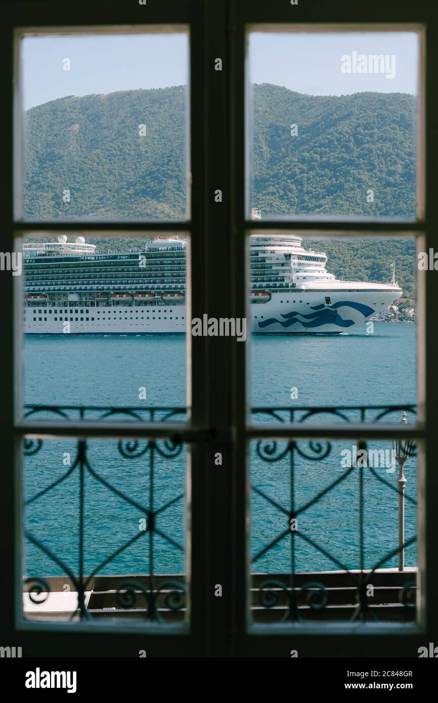 The cruise liner sails in the window of the hotel room Stock Photo - Alamy