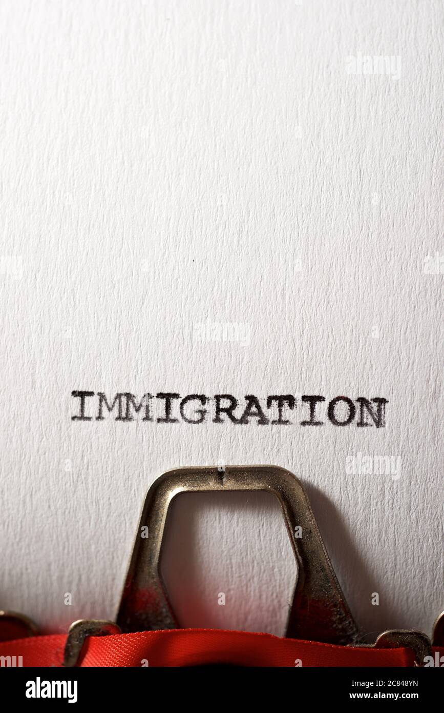 Immigration word written with a typewriter Stock Photo - Alamy