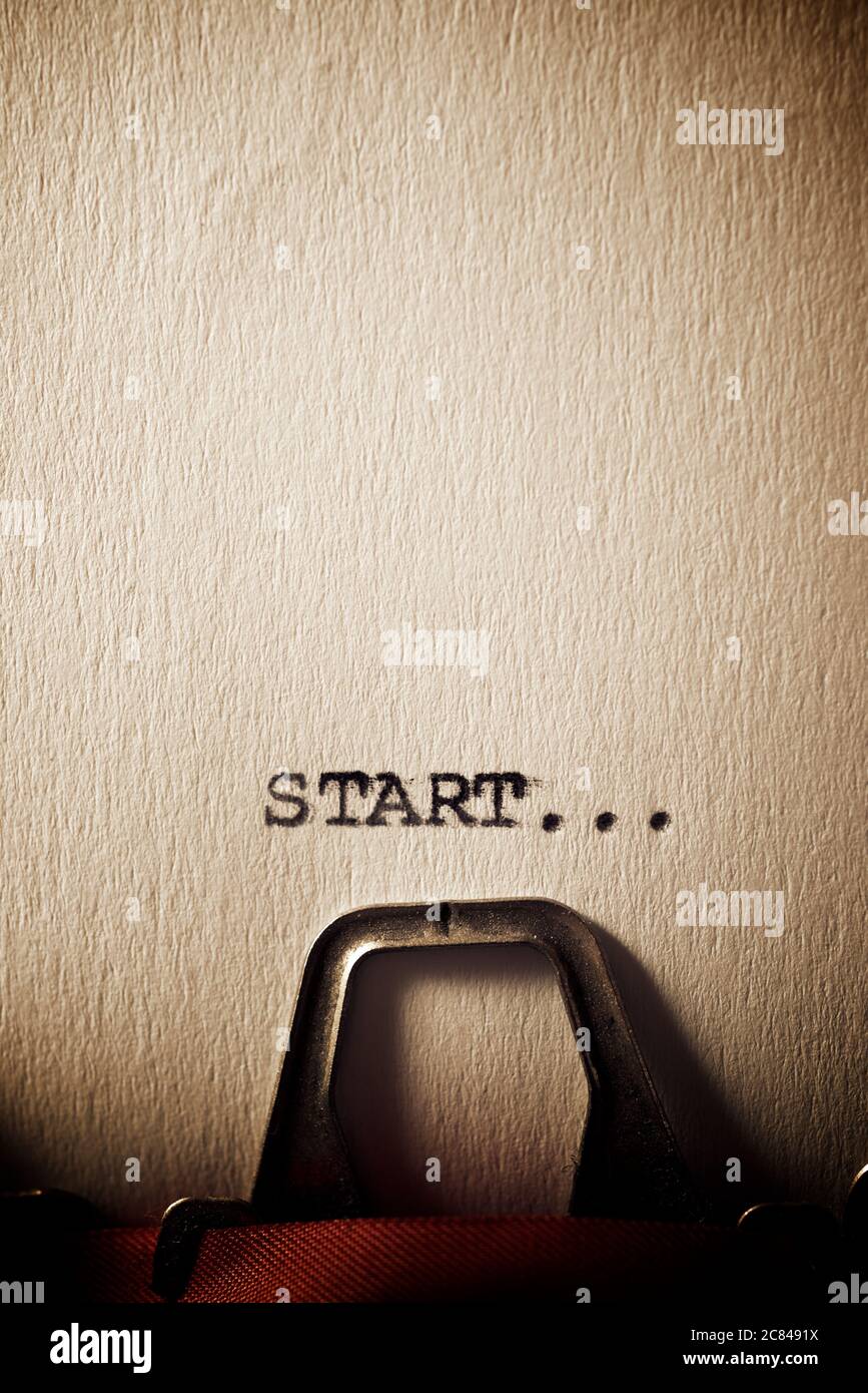Start word written with a typewriter Stock Photo - Alamy