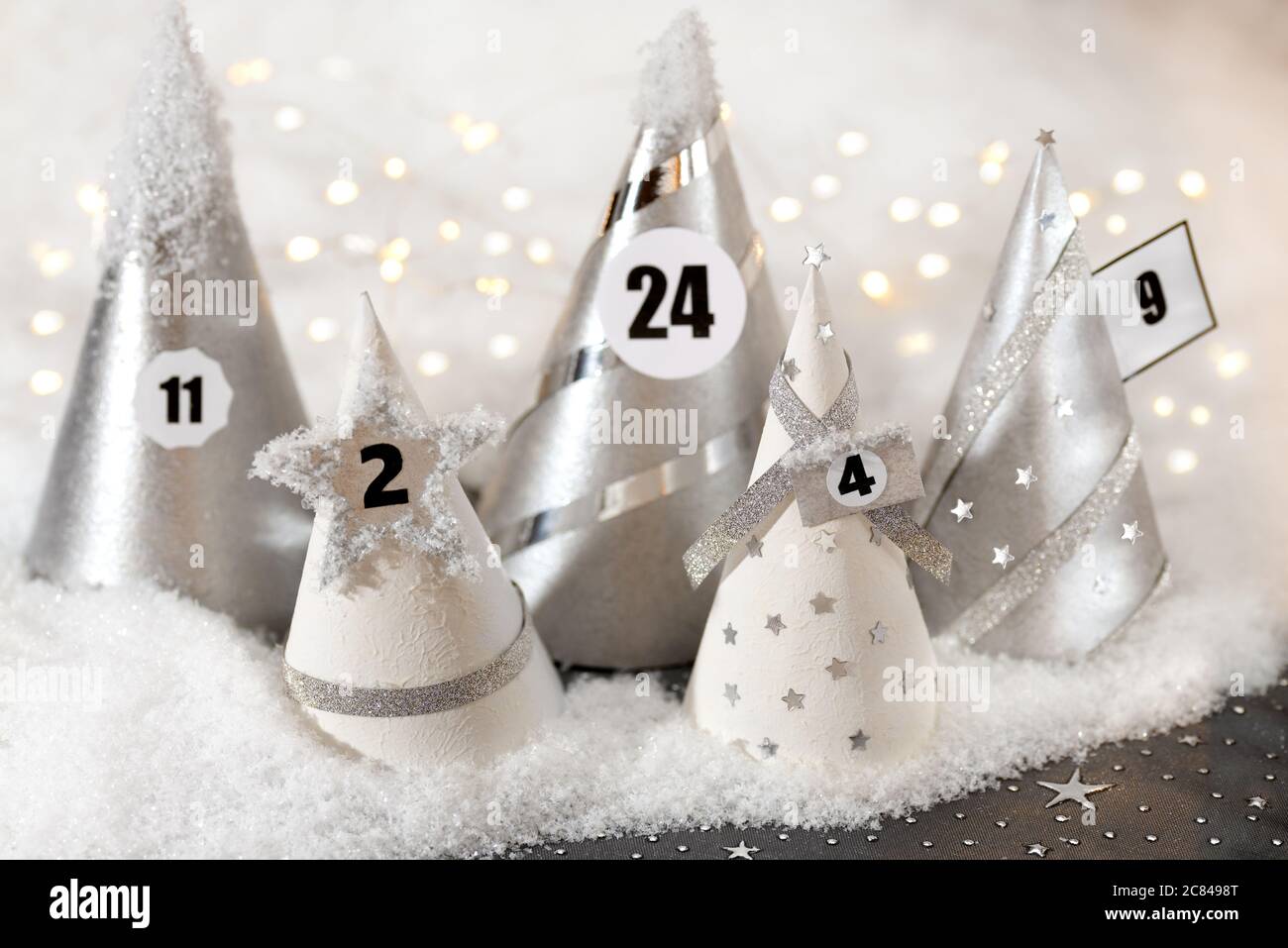 Festive Advent calendar with lights and snow Stock Photo - Alamy