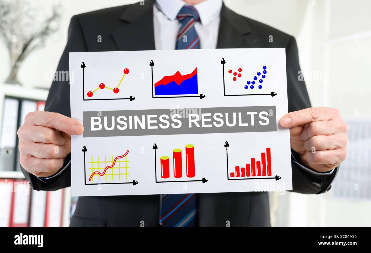 Paper showing business results concept held by a businessman Stock ...