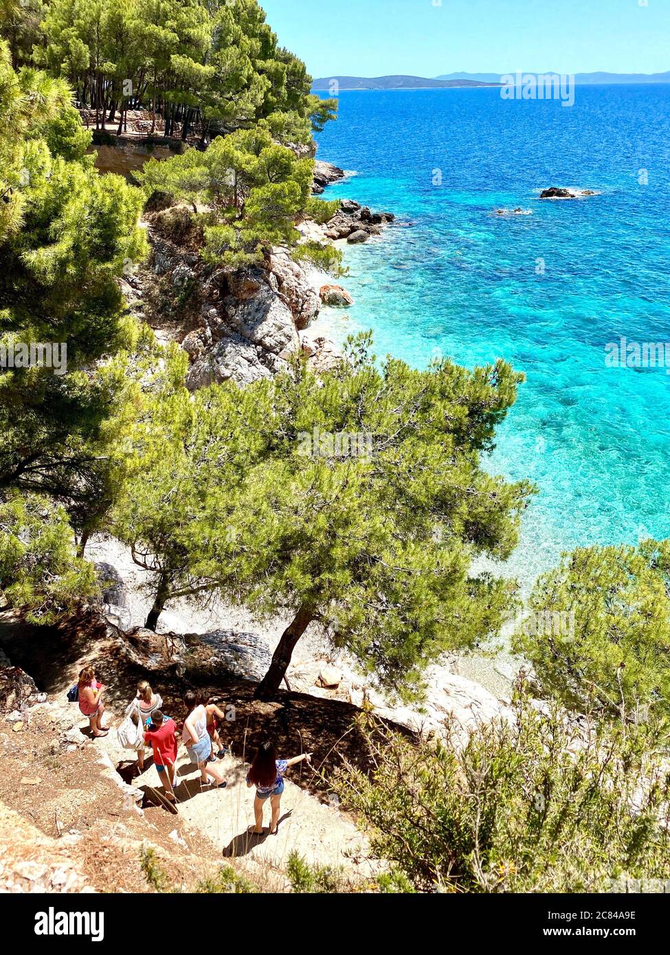 The beautiful crystal clear blue waters of the Adriatic Sea. The path ...