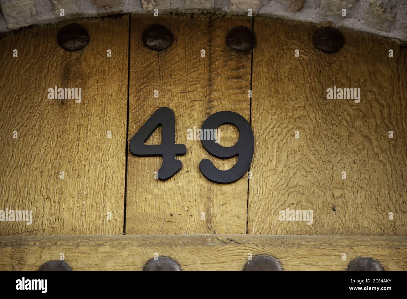 Number forty-nine, detail of odd number on a door Stock Photo - Alamy