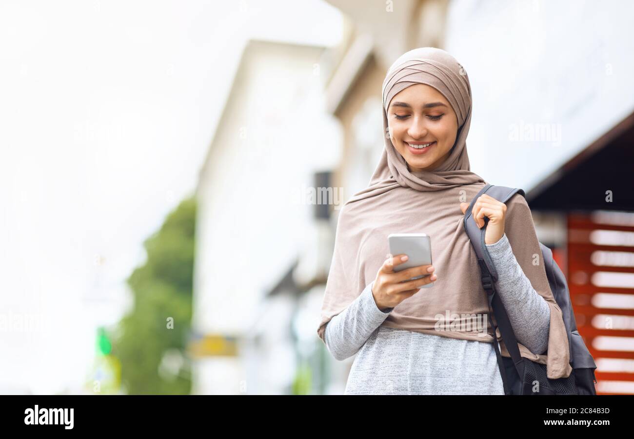 Muslim girl walking hi-res stock photography and images - Alamy