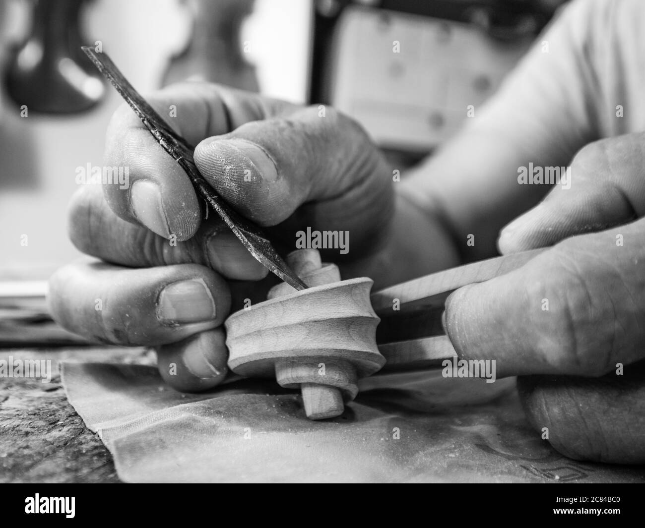 Person carving in wood Black and White Stock Photos & Images - Alamy