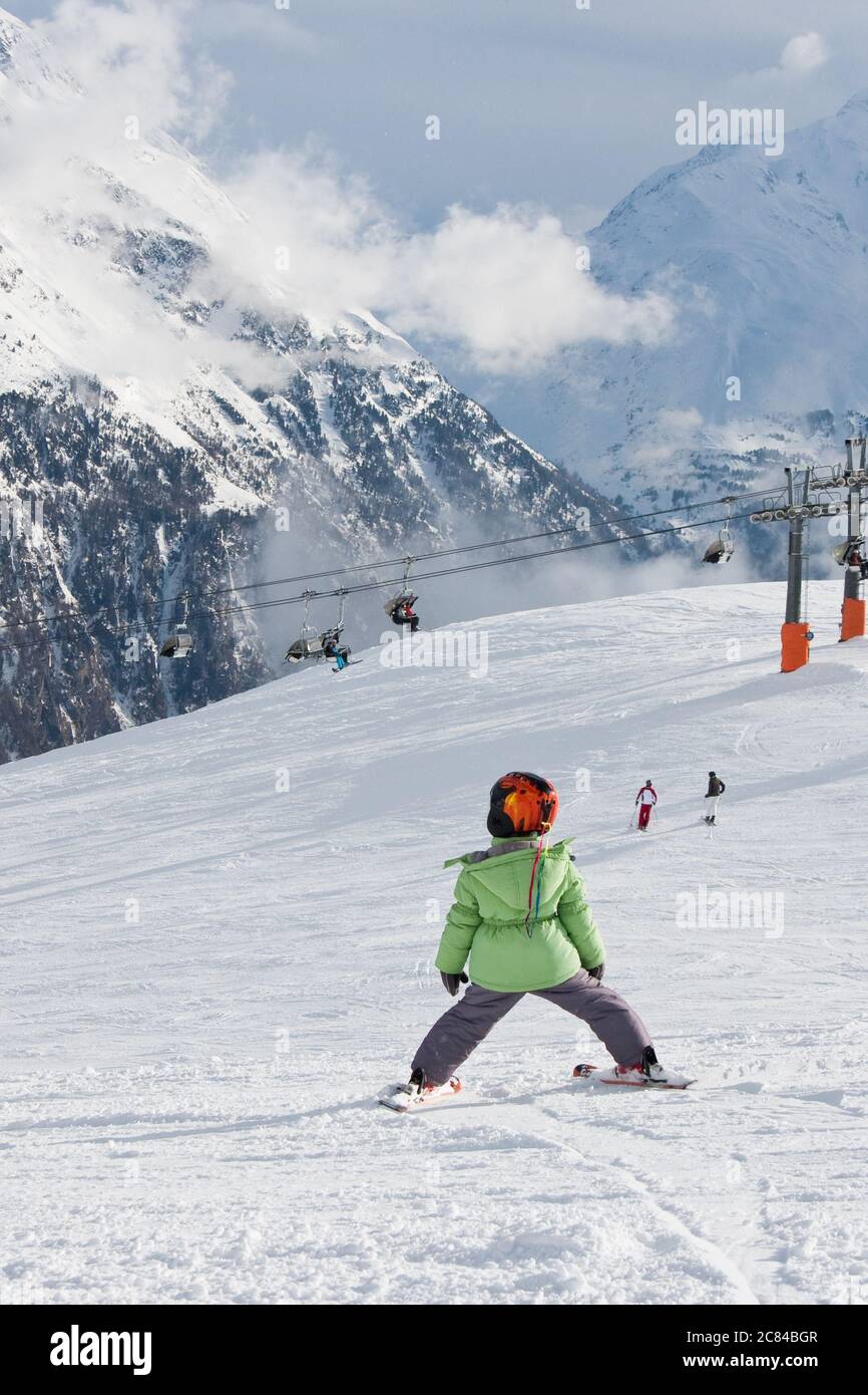 The first steps on skis Stock Photo - Alamy