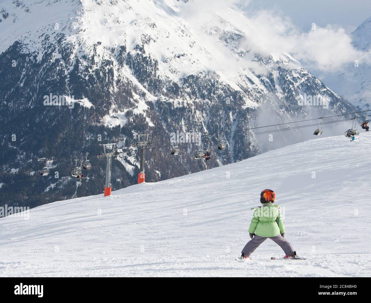 The first steps on skis Stock Photo - Alamy
