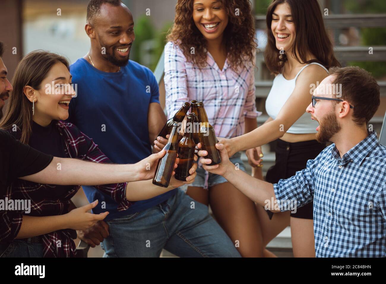 Group of happy friends having beer party in summer day. Resting ...