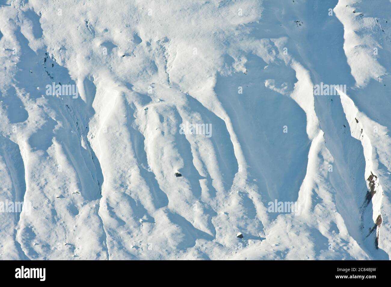 Mountain slope covered with snow. Background Stock Photo - Alamy