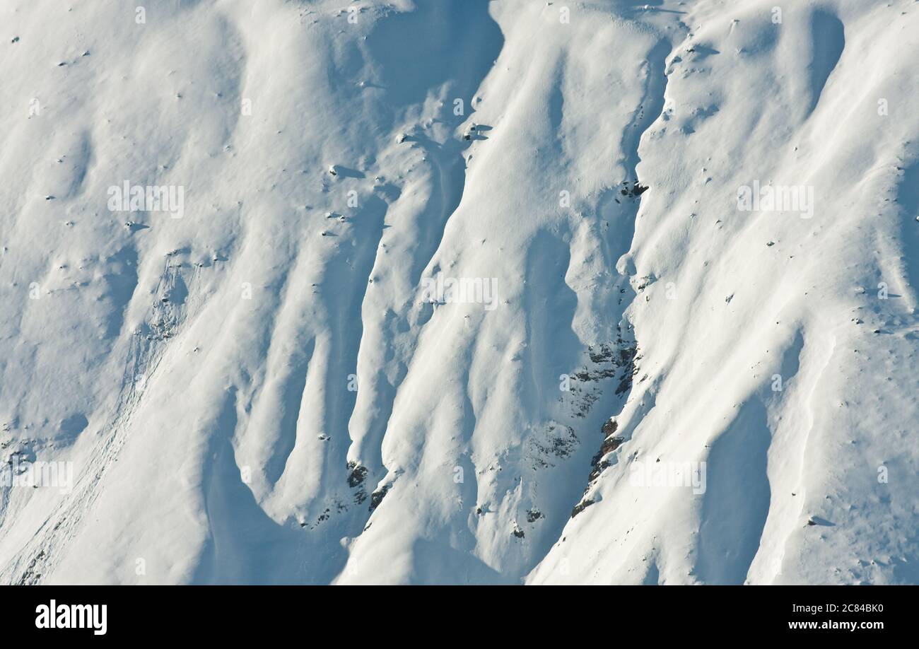 Mountain slope covered with snow. Background Stock Photo - Alamy
