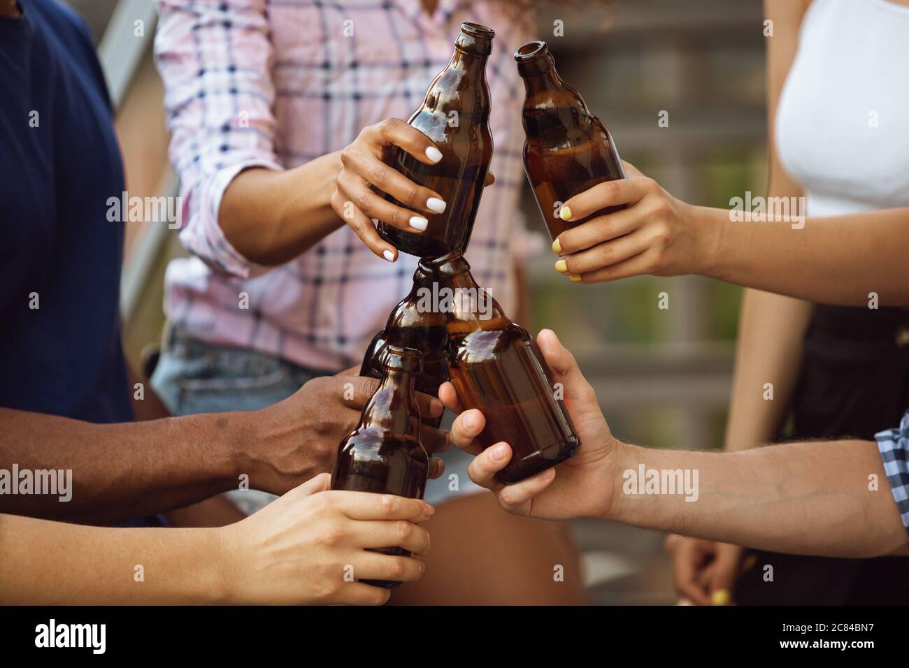 Group of happy friends having beer party in summer day. Resting ...