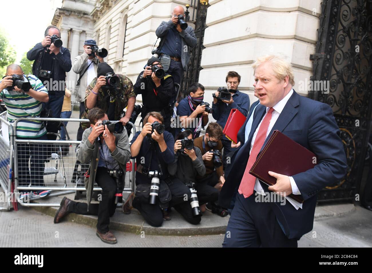 Prime Minister Boris Johnson arrives in Downing Street, after attending ...