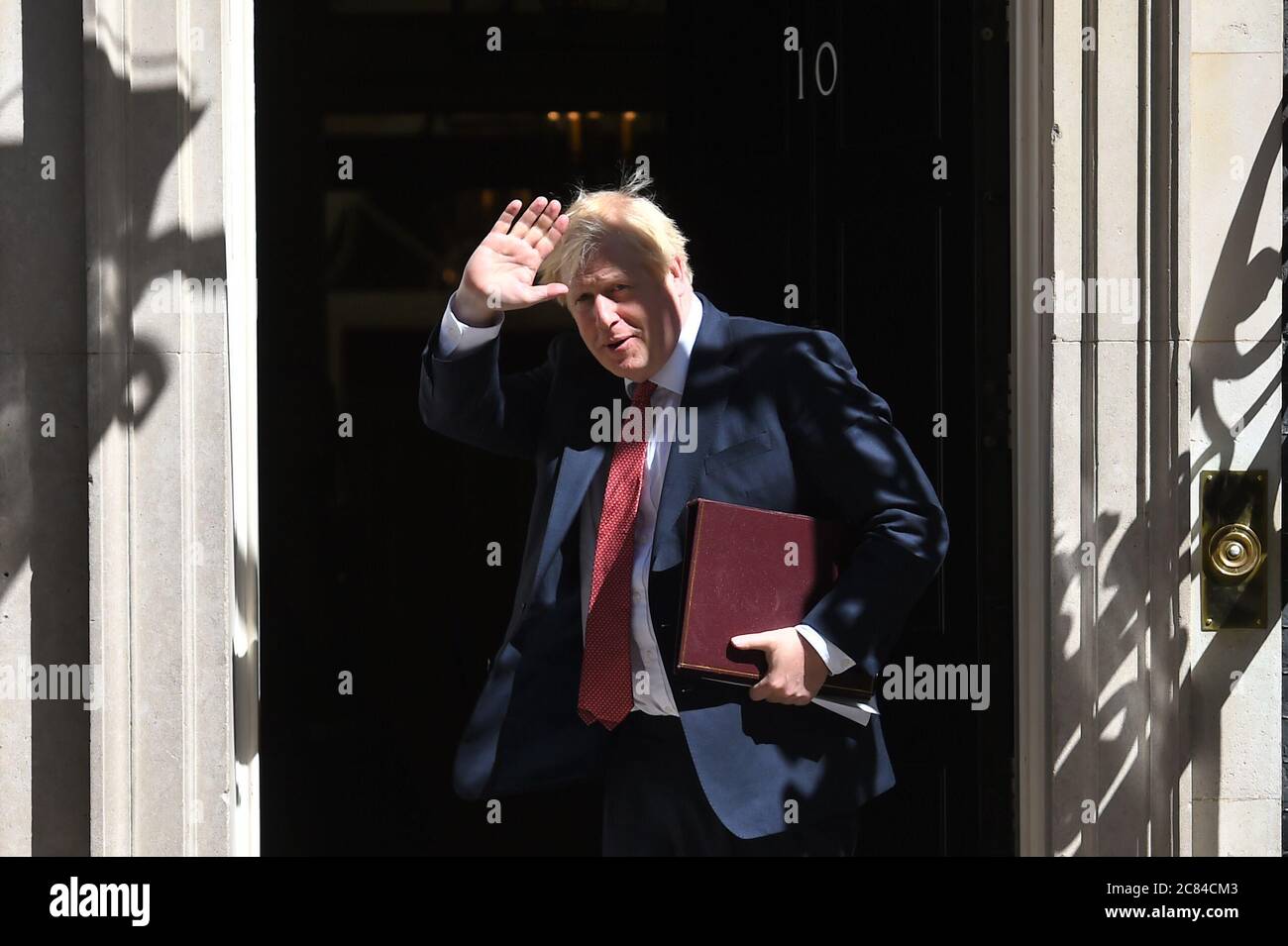 Prime Minister Boris Johnson arrives in Downing Street, after attending ...