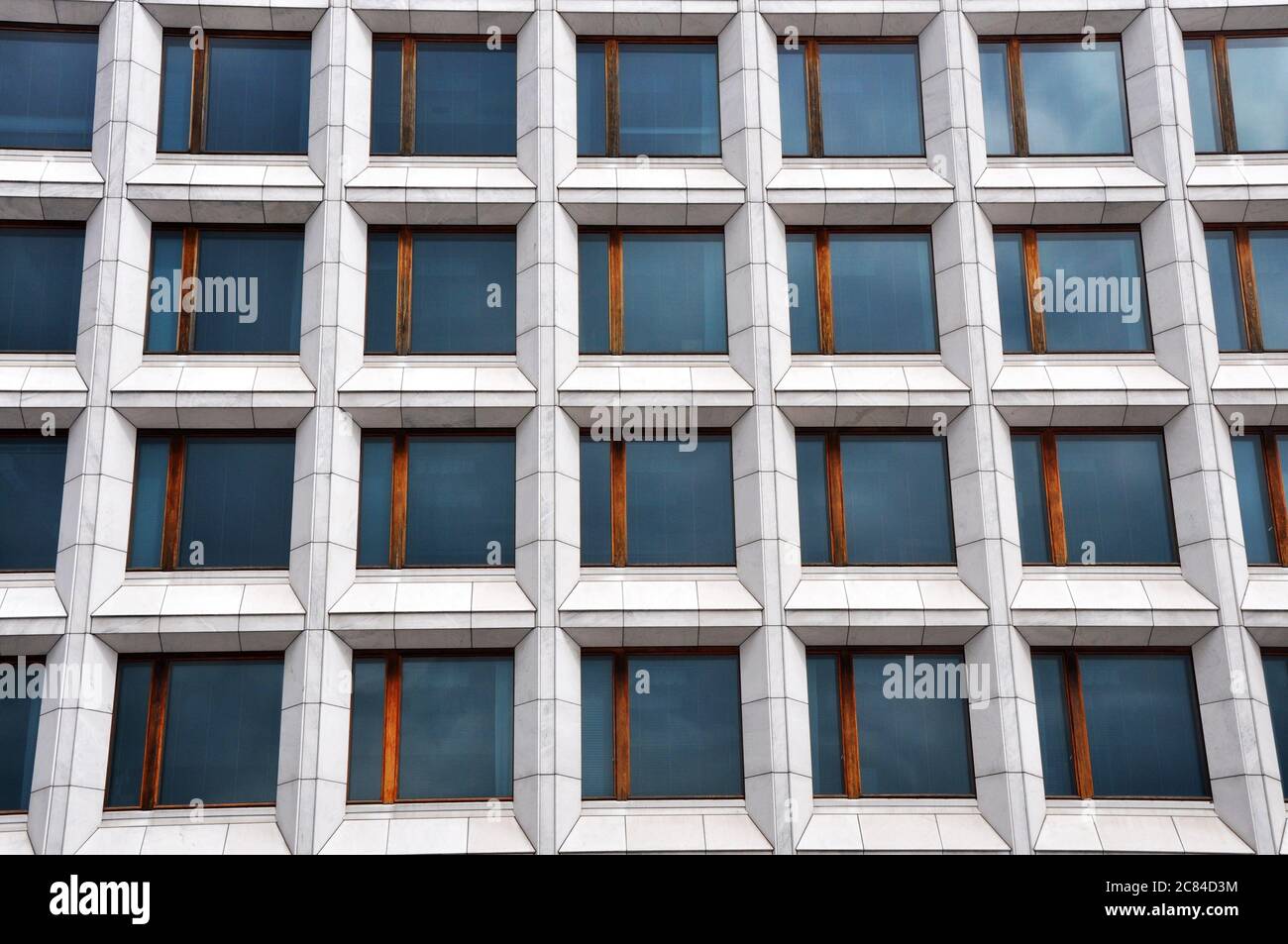 Tall office building with a lot of windows - great for background or ...