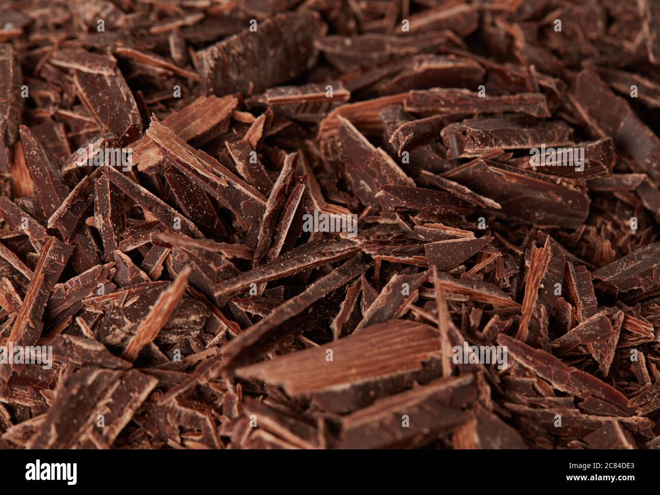 Chocolate chips background Stock Photo - Alamy