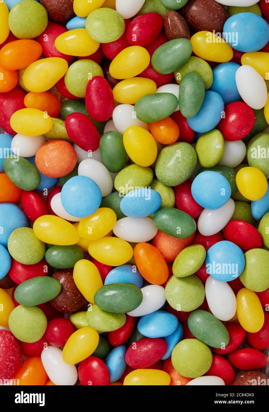 Multi-colored candy background Stock Photo - Alamy