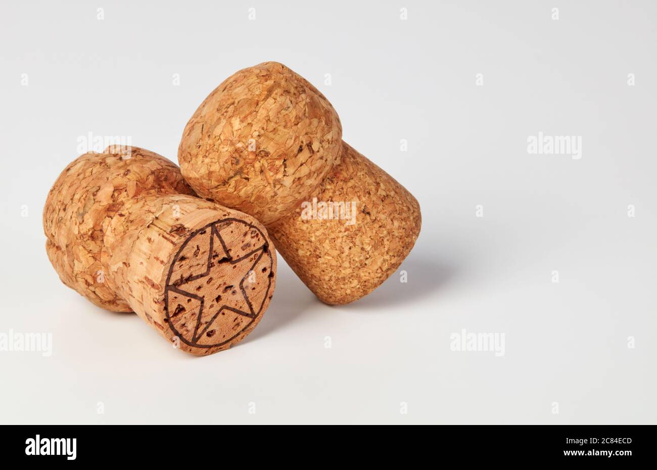 Champagne corks on white background Stock Photo - Alamy