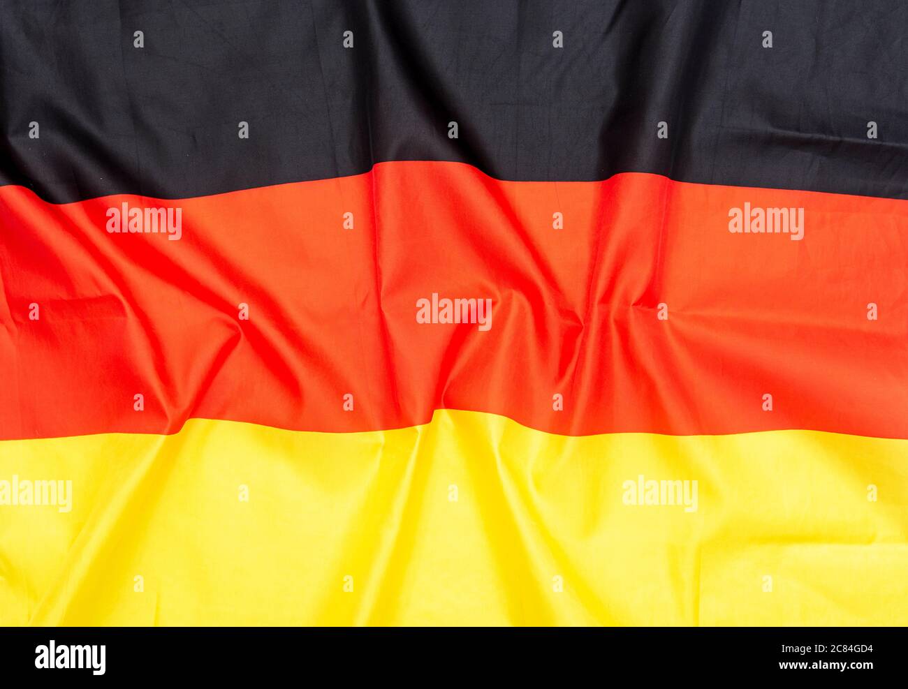 Natural fabric crumpled flag of Germany or German flag Stock Photo - Alamy