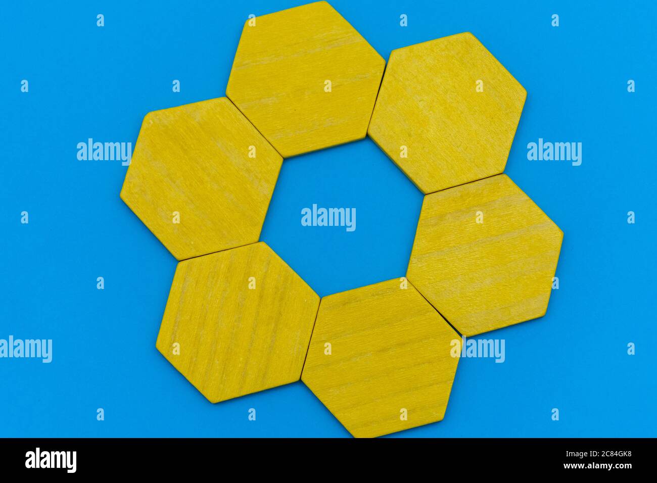 Bright colored yellow tangram flower child geometric shape puzzle ...