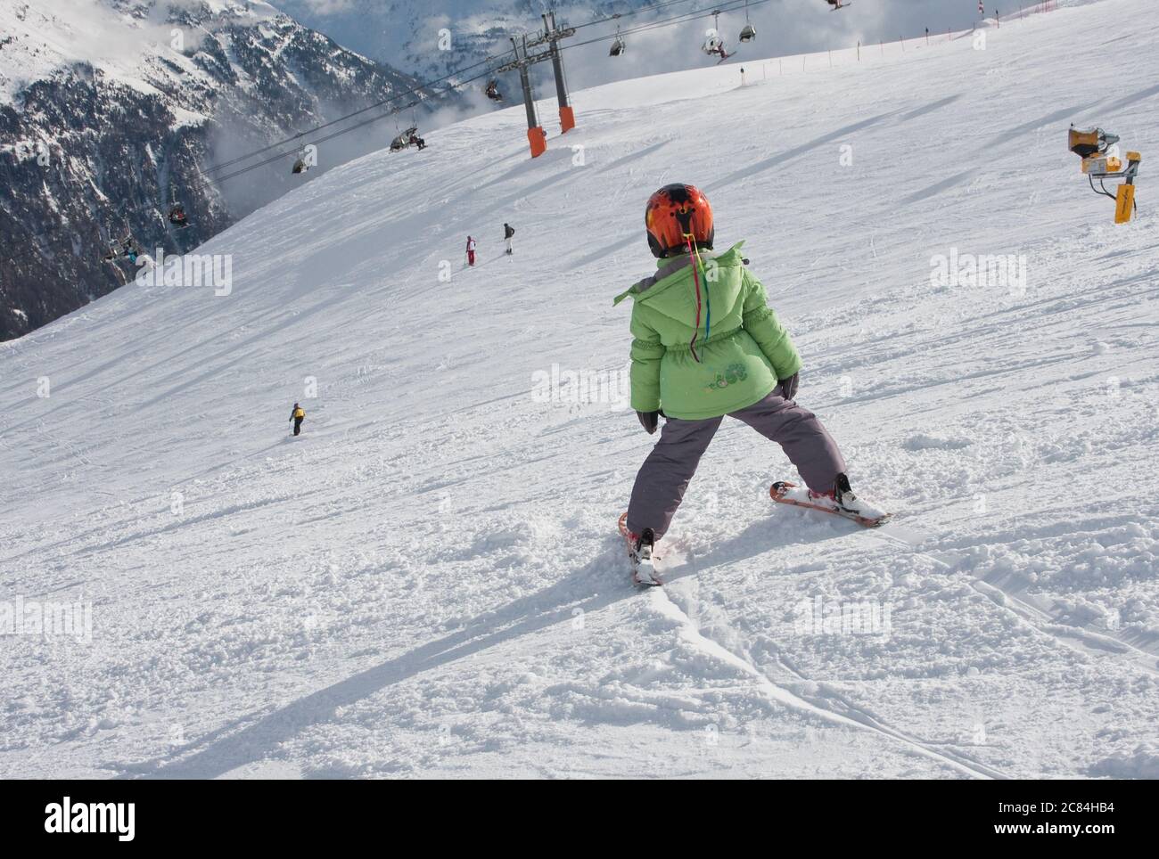 The first steps on skis Stock Photo - Alamy
