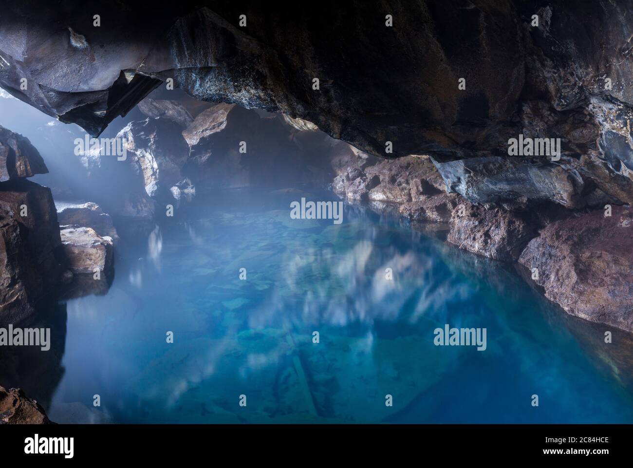 Grjótagjá, small lava cave near lake Mývatn with a thermal spring ...