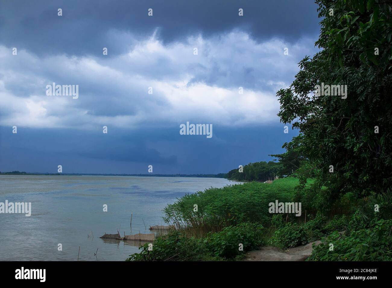 Blue sky background with beautiful river Stock Photo - Alamy