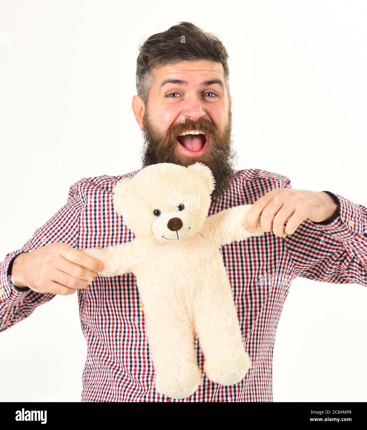 Man with cheerful expression holds cute teddy bear, isolated on white ...