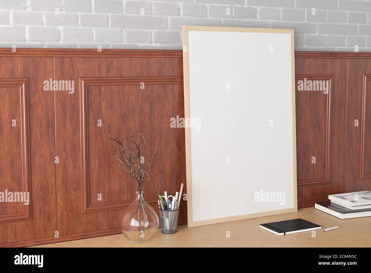 Vertical poster frame mockup on the wooden table of home studio ...