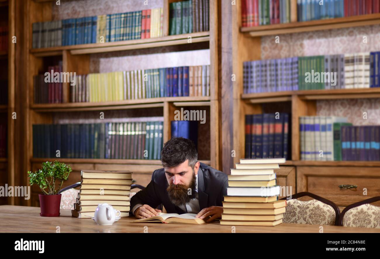 Science and studying concept. Researcher or teacher reading book. Man ...