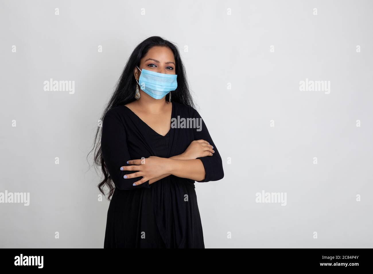 Indian woman wearing a mask hi-res stock photography and images - Alamy