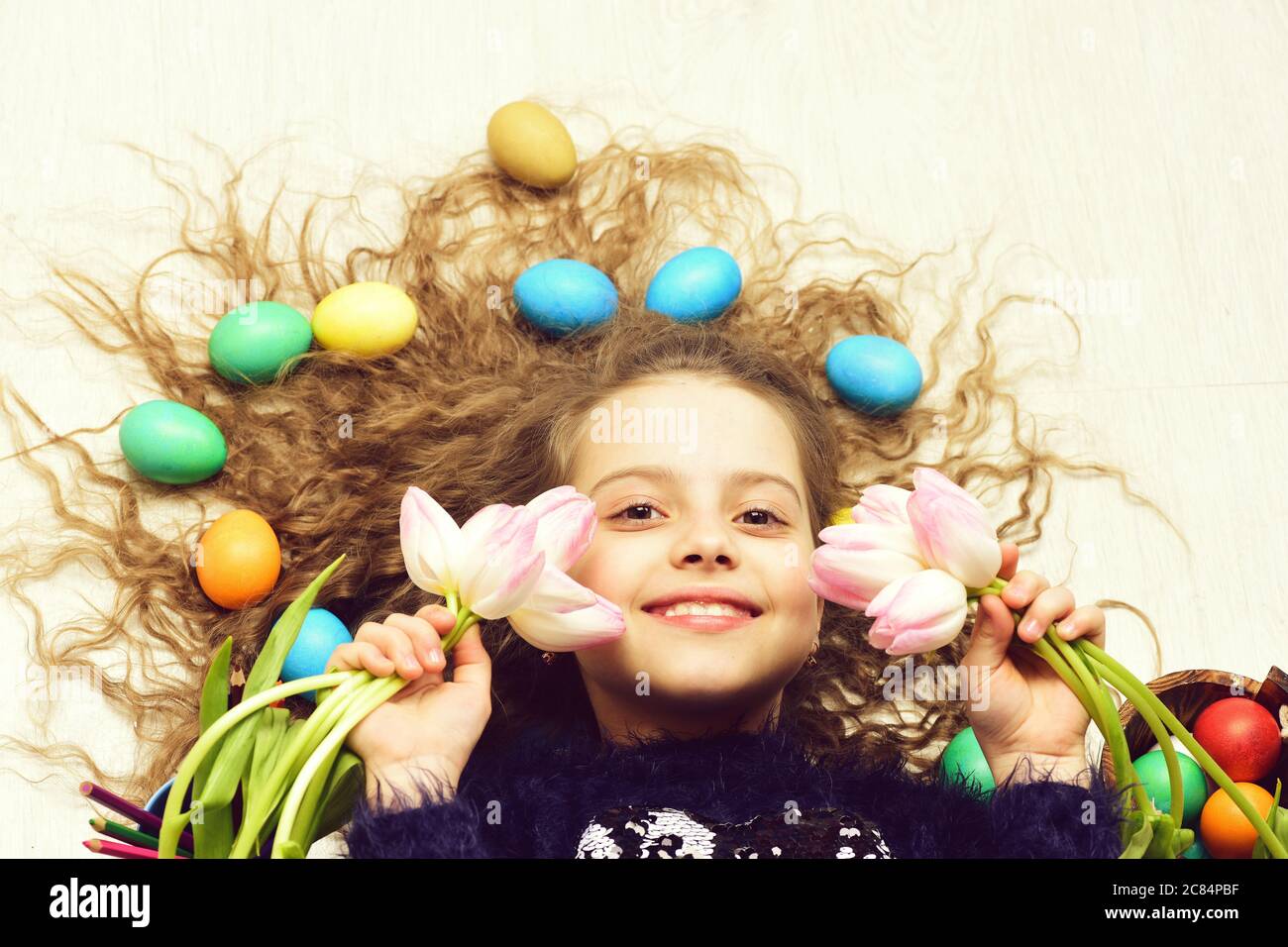 happy easter spring holiday, small child, girl with colorful eggs in ...